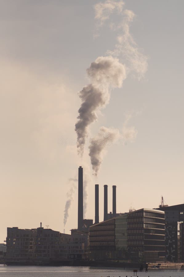 Factory chimney with smoke stock photo. Image of fuel - 65377116