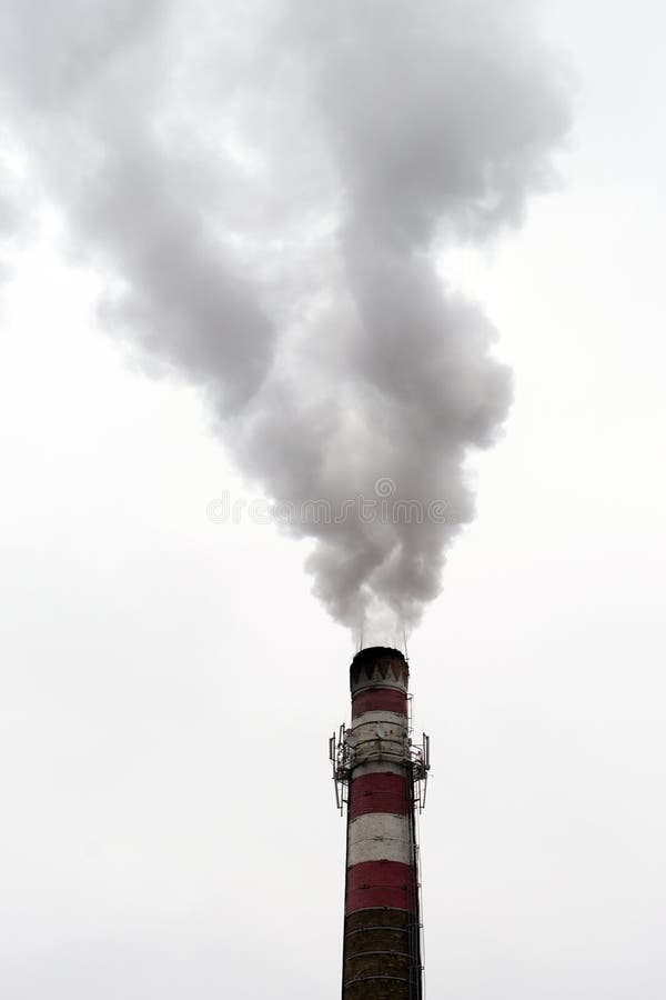 Factory chimney with smoke stock image. Image of chemical - 63600555