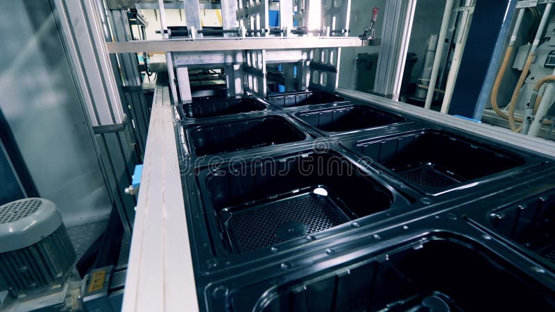 Factory Conveyor is Relocating Plastic Containers Stock Footage - Video ...