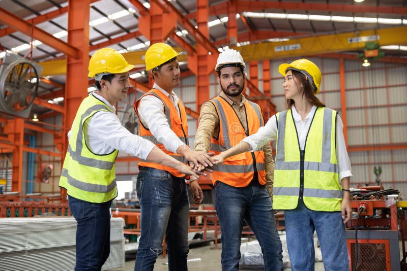 Factory Engineer Joint Hands Showing Their Teamwork Stock Image - Image ...