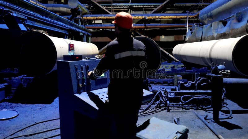 Factory Engineer Operates Pipe Painting Automatic Machine Stock Footage ...