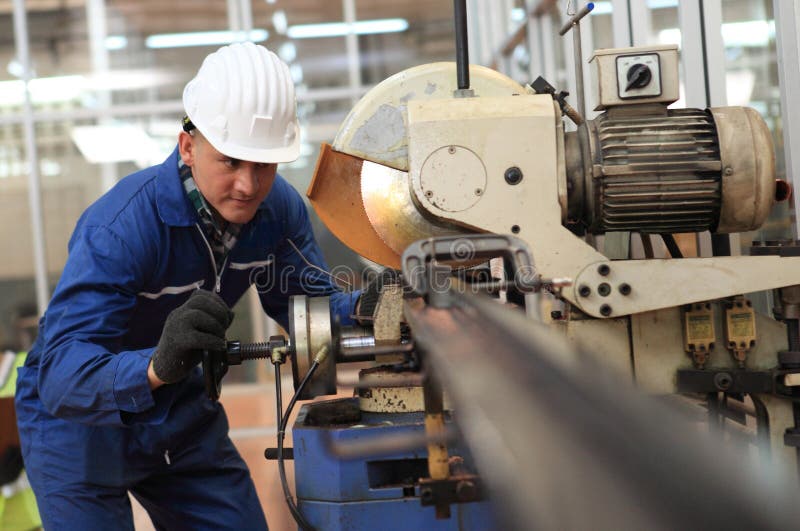Factory Engineer Operating Big Machine Cut Off Stock Photo - Image of ...