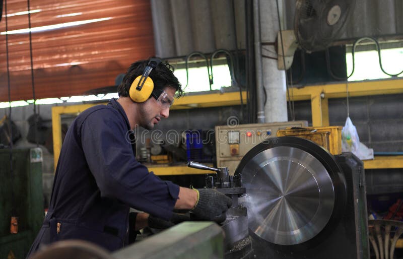 Factory Engineer Operating Big Machine Stock Image - Image of ...