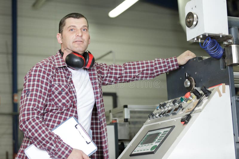 Factory Engineer Operating Hydraulic Tube Bender Stock Photo - Image of ...