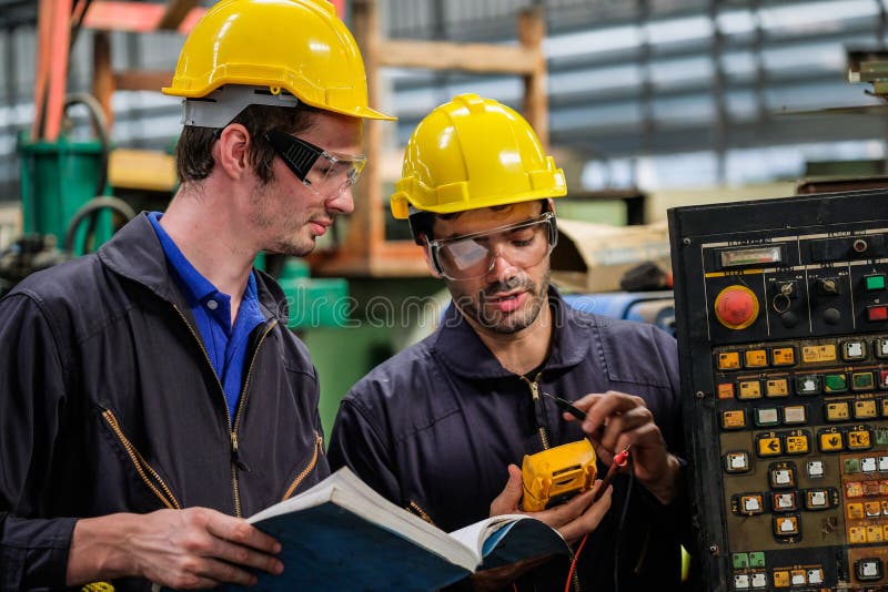 Factory Engineers Inspect the Factory Production Service Team Stock ...