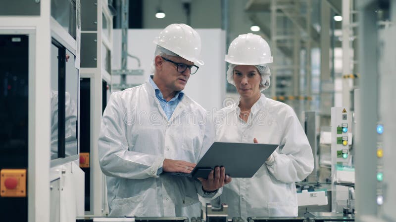 Factory Engineers are Observing Manufacturing Process Stock Video ...