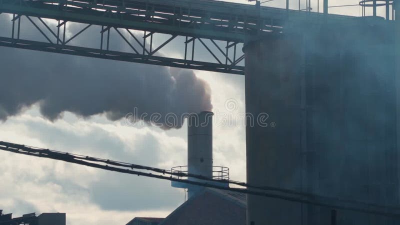 Factory Expelling Pollution and Smoke through a Chimney. Environmental ...