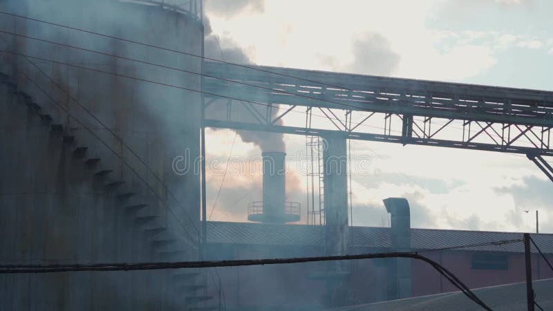 Factory Expelling Pollution and Smoke through a Chimney. Environmental ...