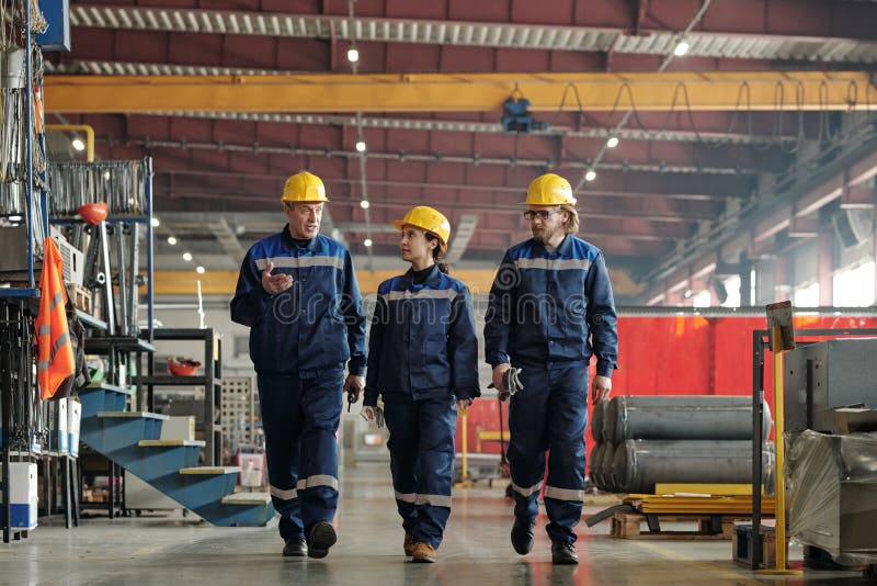 Factory Foreman Explaining Tasks To Employees Stock Photo - Image of ...