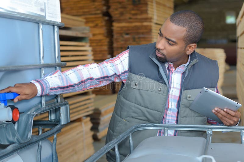 Factory inspector at work stock photo. Image of manual - 198492462