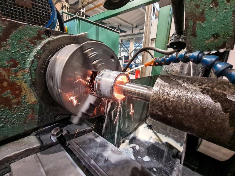 At the Factory, Internal Grinding on a CNC Machine, Small Sparks and ...