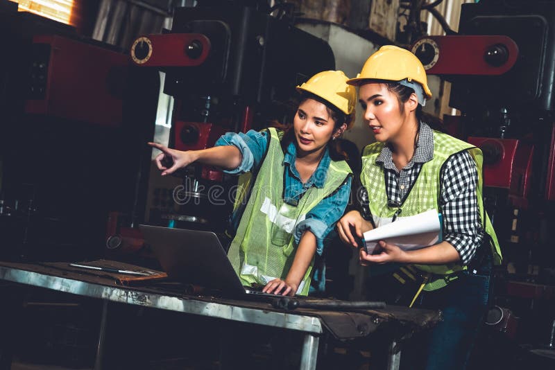 Factory Job Workers Working and Discussing Manufacturing Plan in the ...