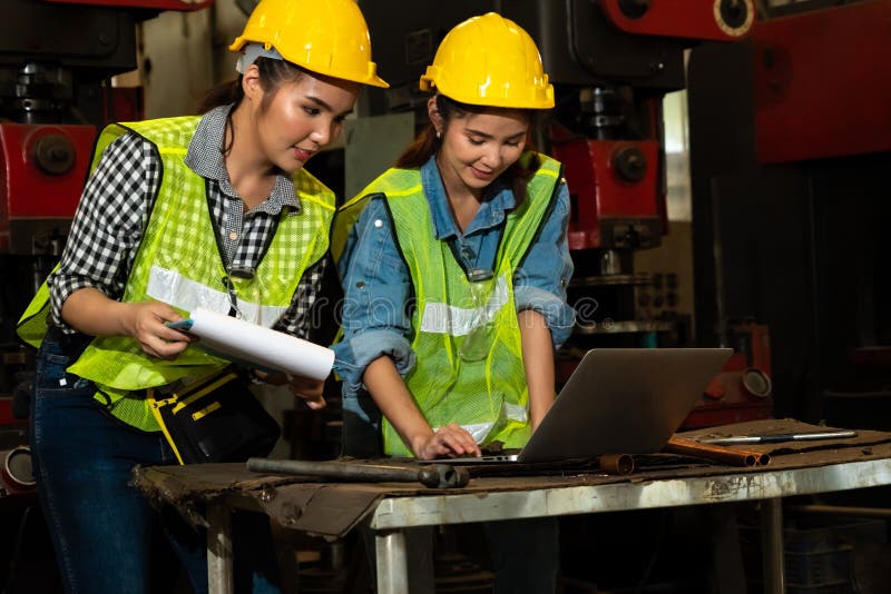 Factory Job Workers Working and Discussing Manufacturing Plan in the ...