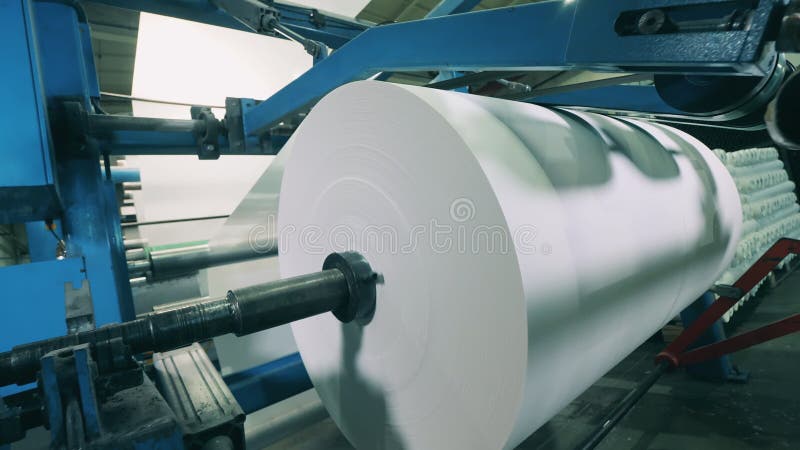 Massive Paper Roll Getting Made in a Paper Processing Machine Stock ...