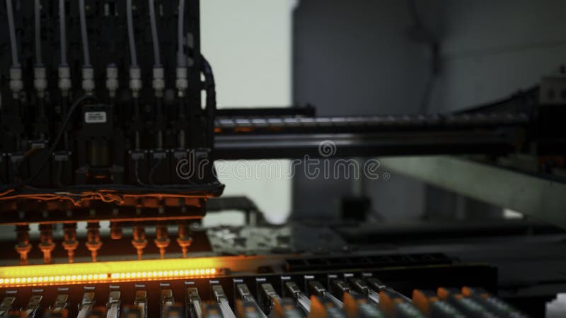Factory Machine at Work: Printed Circuit Board Being Assembled with ...