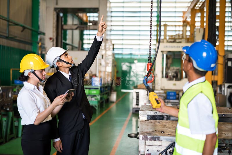 Factory Manager Command Lifting Crane in Warehouse Stock Image - Image ...
