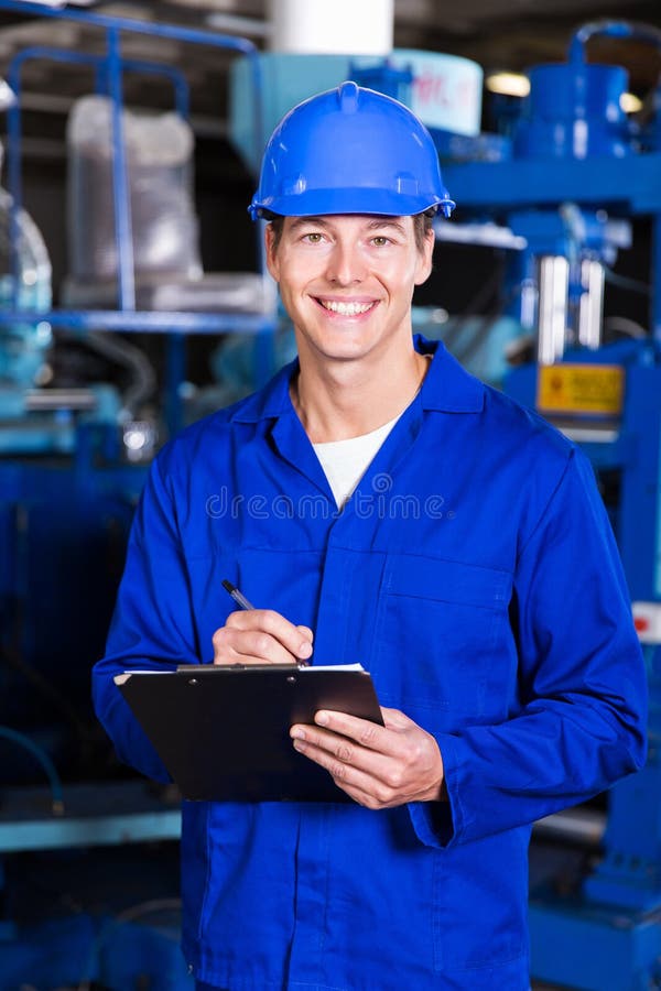 Factory Manager Using Tablet Computer in Warehouse or Factory Stock ...