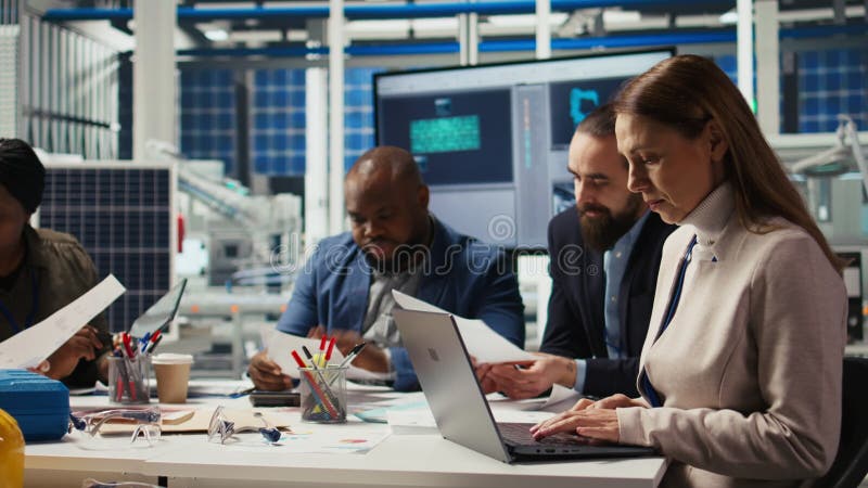 Factory Manager Looking Over Paperwork Files, Developing Business Model ...