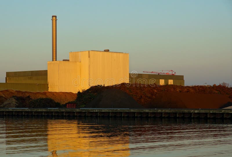 Factory near the river stock image. Image of technology - 22083185