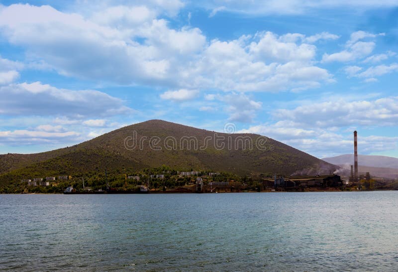 Factory next to the sea stock image. Image of larymna - 124836311