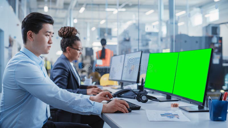 Factory Office Room: Industrial Engineers Developing Models of a Heavy ...