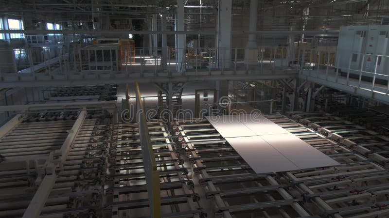Factory Production Line. a Worker Works in a Factory. Drywall ...