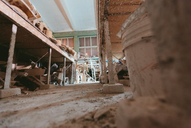 Factory for Production of Plaster Molds. Cluttered Dusty Old Warehouse ...