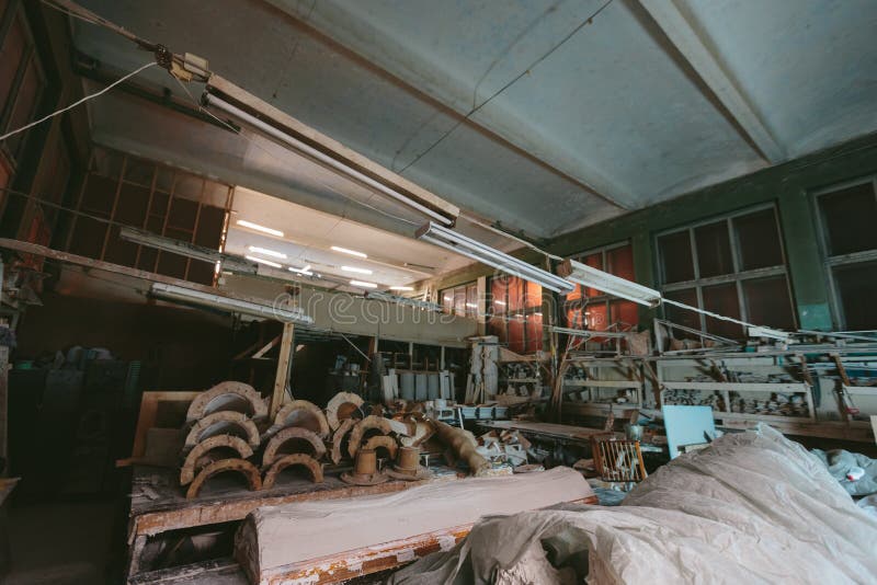 Factory for Production of Plaster Molds. Cluttered Dusty Old Warehouse ...