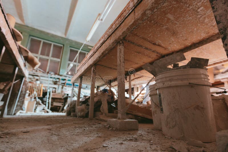 Factory for Production of Plaster Molds. Cluttered Dusty Old Warehouse ...
