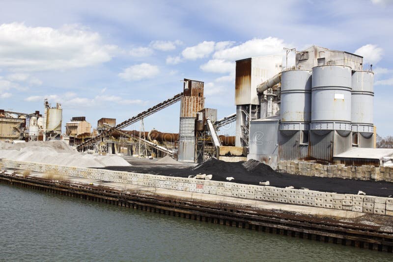 Factory by the river stock image. Image of reflection - 19224125