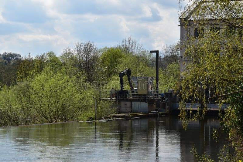 Factory by the river stock photo. Image of city, plant - 114933108