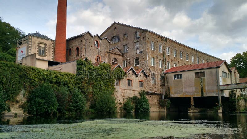 Factory on a river stock photo. Image of castle, industry - 161800606