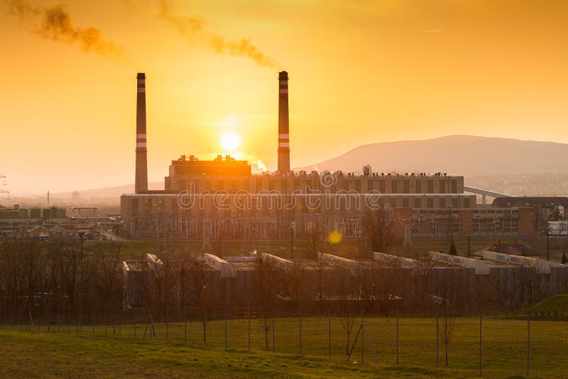 Factory smoke at sunset stock image. Image of dirty, stack - 33974273