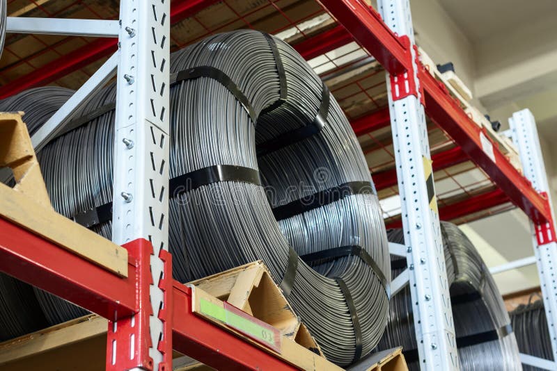 Factory Stock Wire. Wire Spools Lie on Multi-tiered Racks. Stock Photo ...