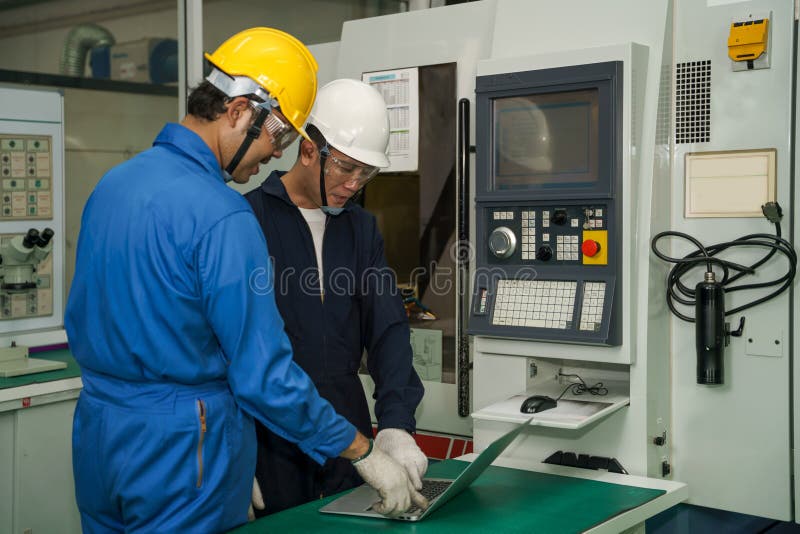 Factory Technician, Foreman and Workers in Technical Discussion Stock ...