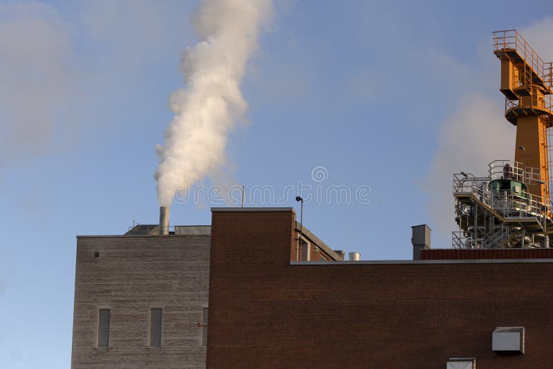 Factory with a tower stock photo. Image of outdoor, chimneys - 70858536
