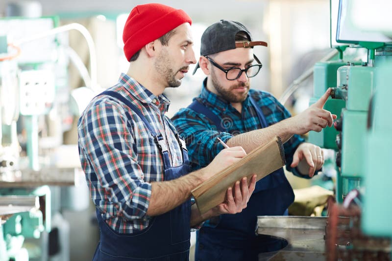 Factory Training stock photo. Image of overalls, people - 143549914
