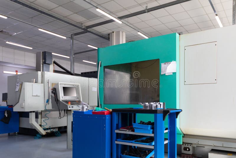 Modern Computerized Factory Equipment Processing Metal Parts Inside ...
