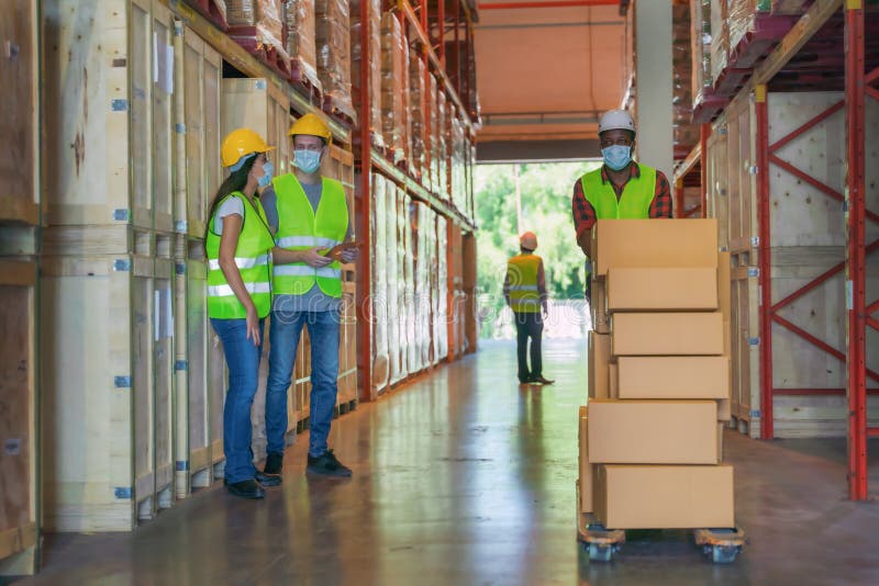 Factory Warehouse Workers Wearing Face Mask at Work Stock Photo - Image ...