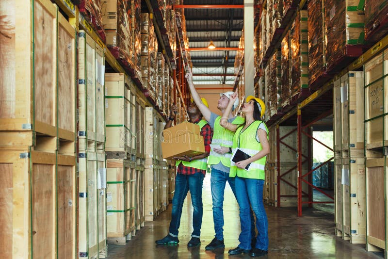 Factory Warehouse Workers Wearing Face Mask at Work in Storage Room ...