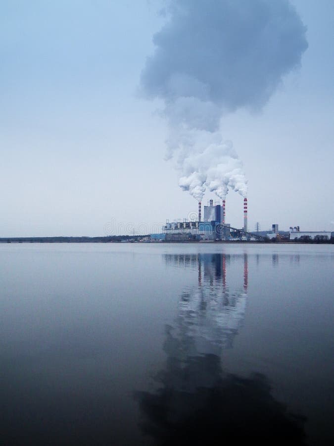 Factory on waterfront stock image. Image of smokestack - 83036831