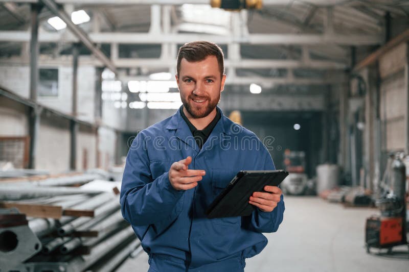 Factory Worker in Blue Uniform is Indoors Stock Image - Image of white ...