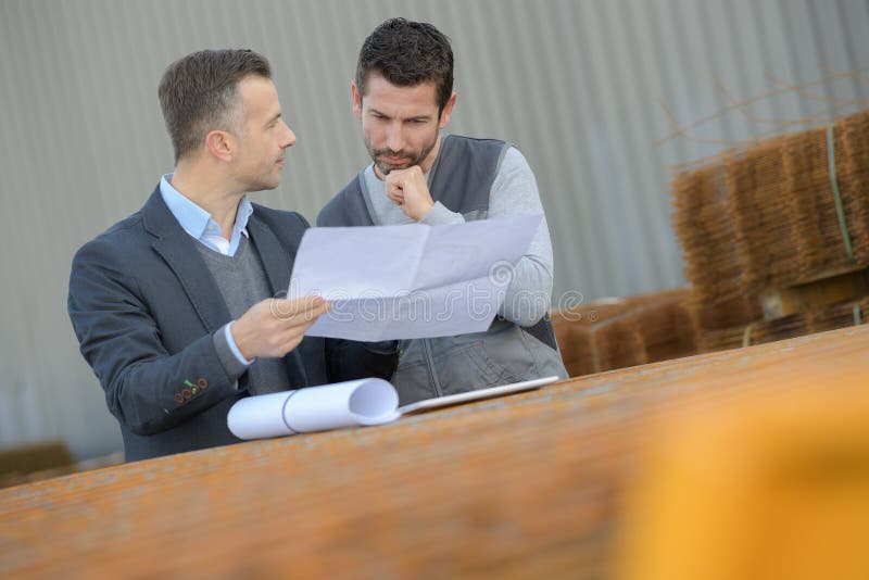 Factory Worker and Boss Checking Paper Stock Photo - Image of happiness ...