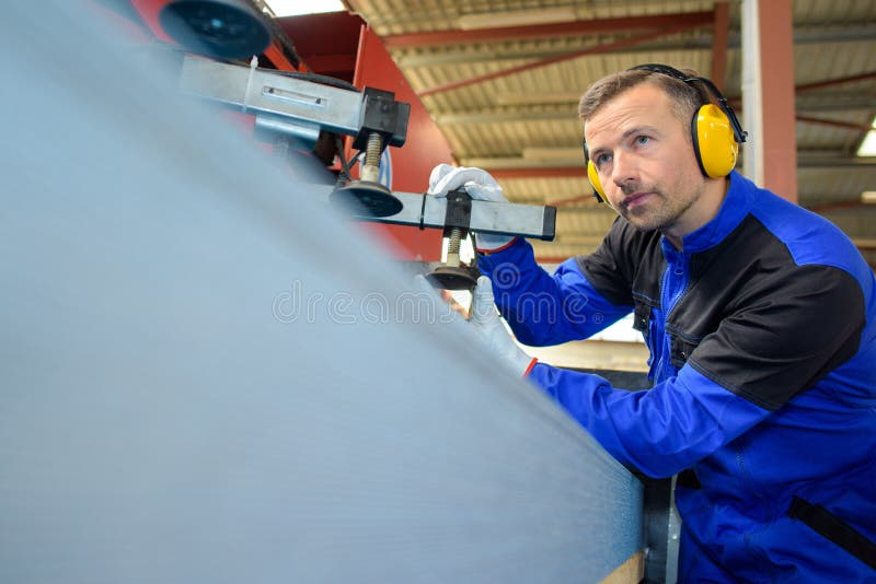 The busy factory worker stock photo. Image of vocation - 117250574