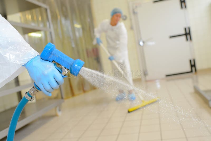 Factory Worker Cleaning Floor Stock Photo - Image of protective, tiled ...