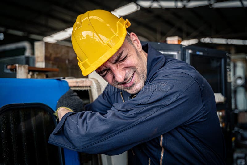 Factory Worker Got His Arm Stuck in the Machine. Stock Image - Image of ...