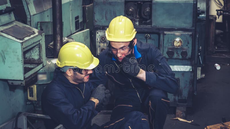 Factory Worker Injured by Accident while Using Machine in Factory Stock ...