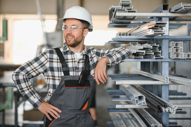 Factory Worker. Man with Helmet Working with Pvc Stock Image - Image of ...