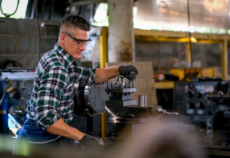 Factory Worker Man Work with the Machine and Look Attractive with ...