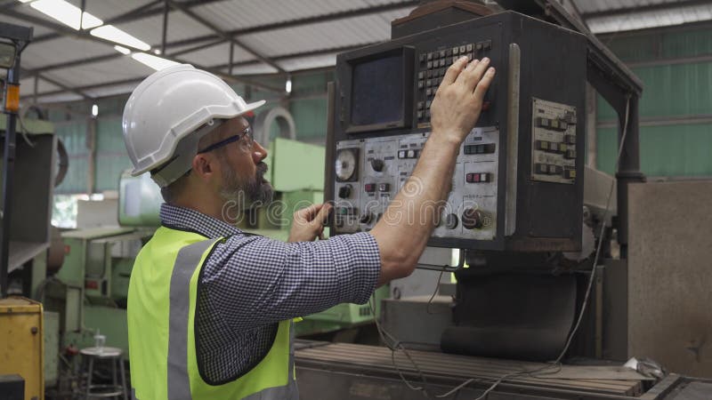 Factory Worker. Man Working on a Factory Machine Stock Footage - Video ...